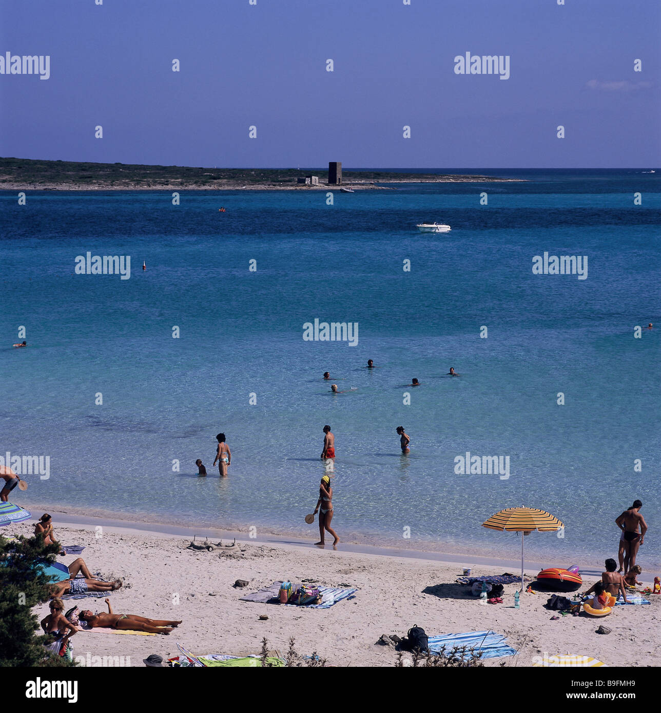 Italy Sardinia Stintino coast beach-scene swimmers lake no models ...