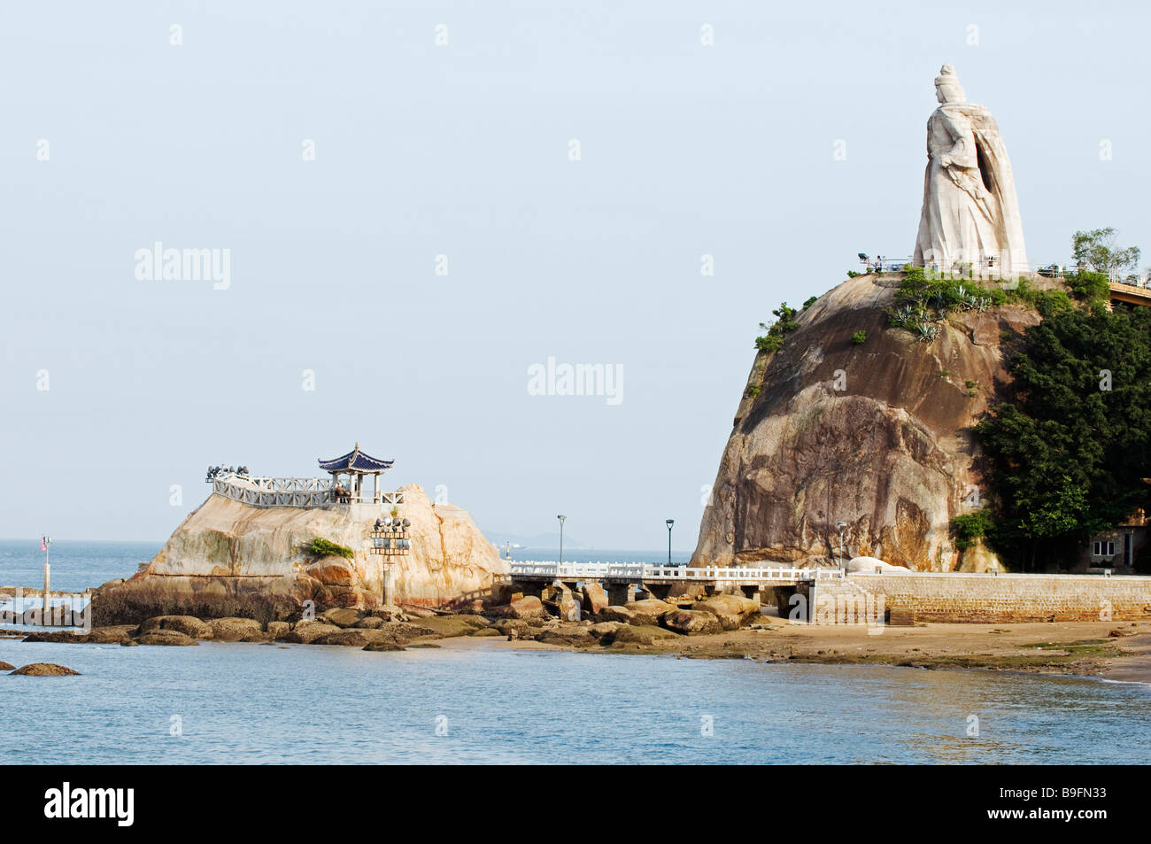 China, Fujian Province, Xiamen. Colonial island of Gulang Yu and statue ...