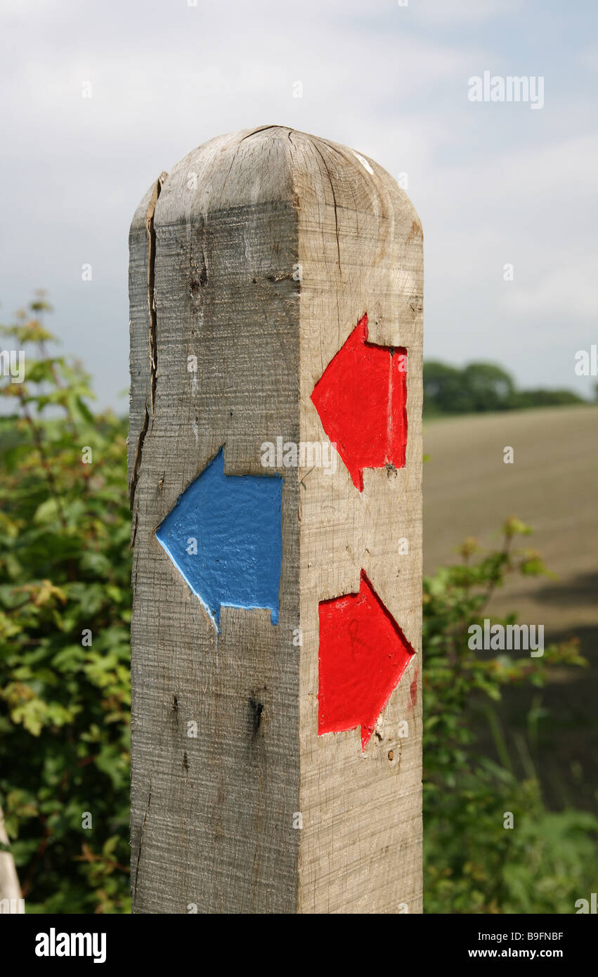 A footpath marking sign in the countryside Stock Photo - Alamy