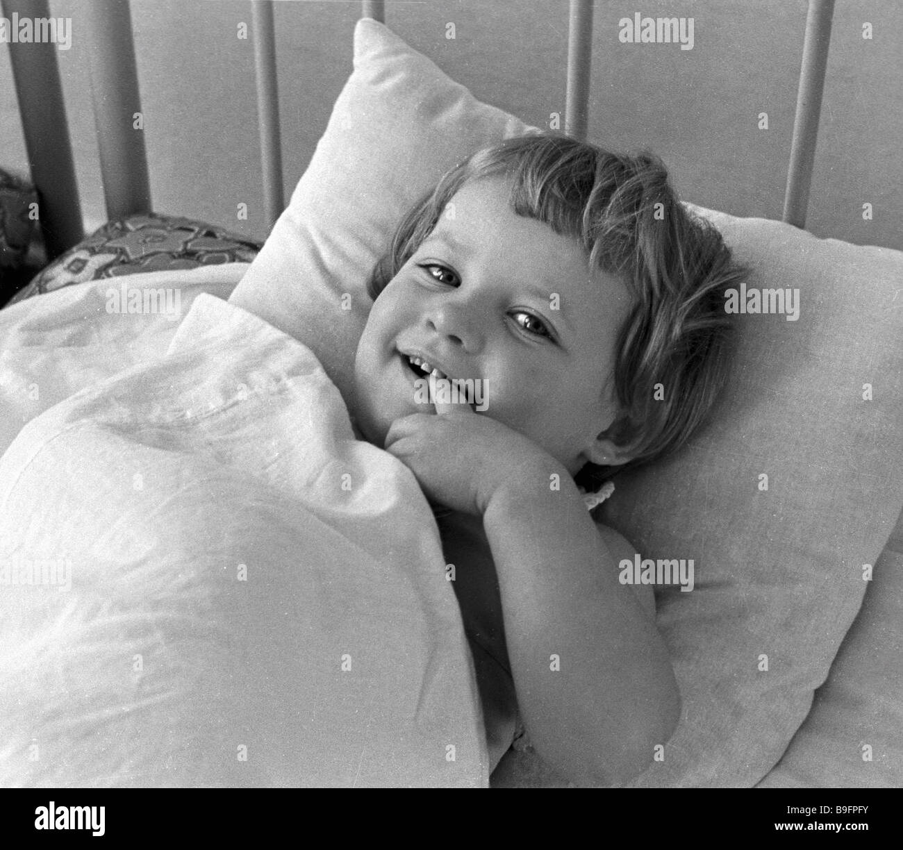 This child is from the Solnyshko Sun daycare center Stock Photo - Alamy