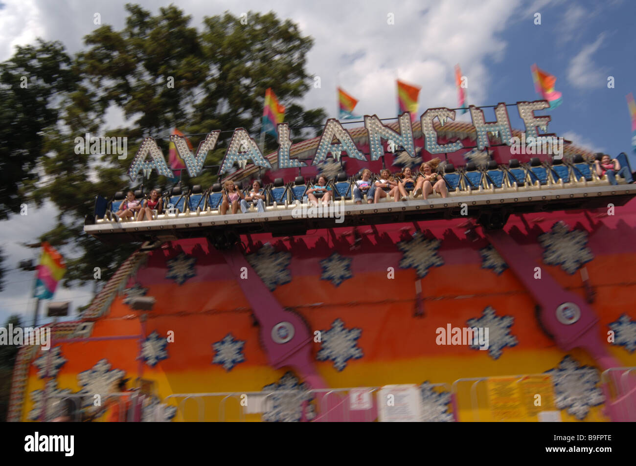 Avalanche amusement ride in mid motion at the Dutchess County Fair in ...
