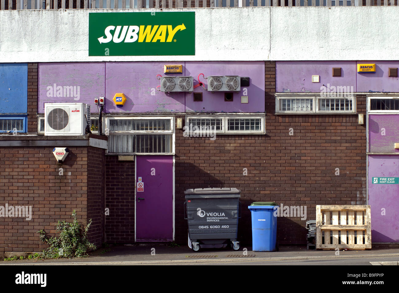 Back door of Subway food outlet, UK Stock Photo - Alamy