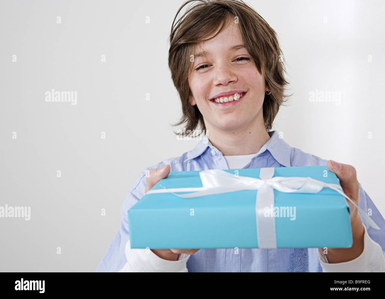 Teenager boy cheerfully gift smiling giving portrait people teenagers ...