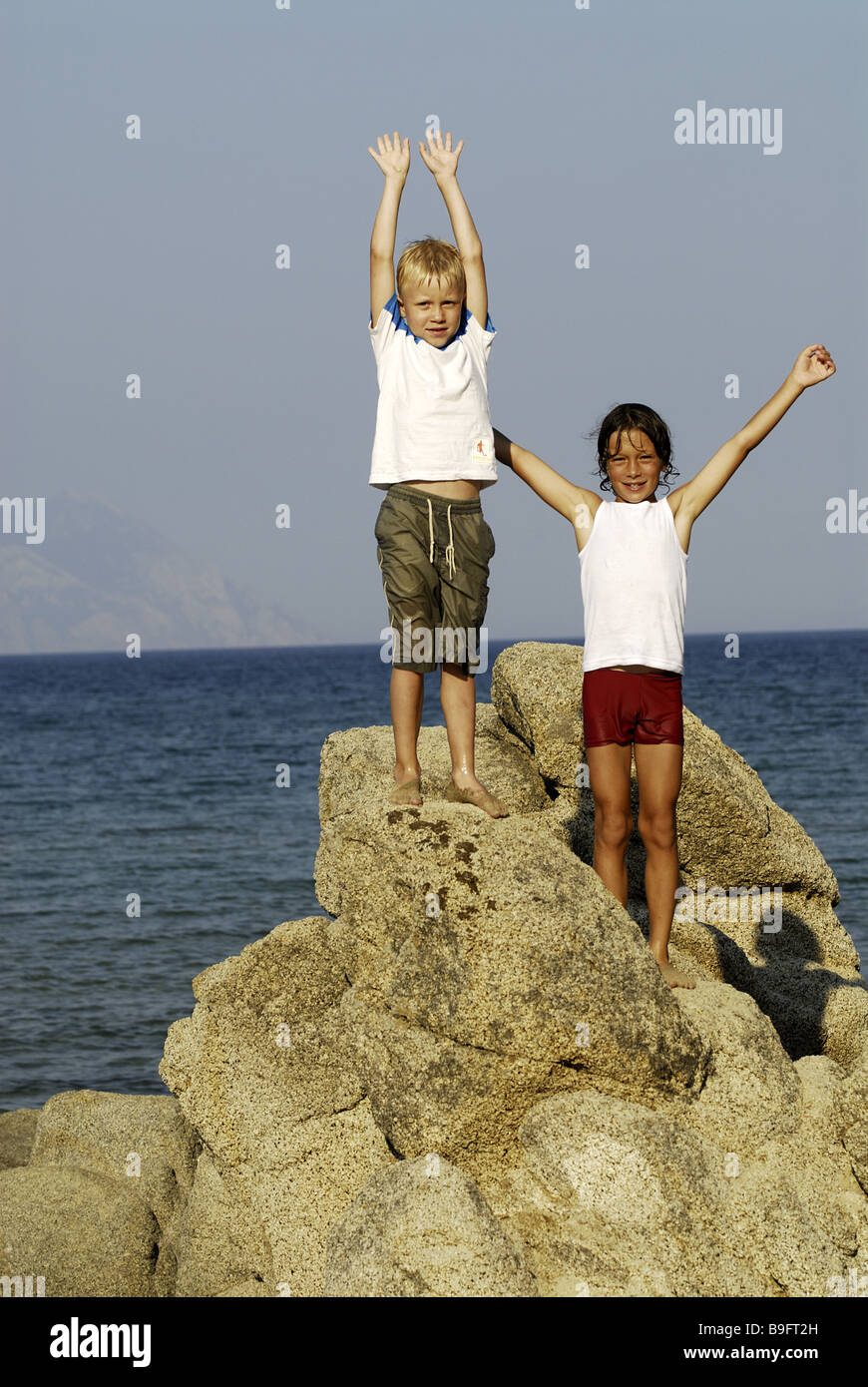 Children stands rocks Stock Photo - Alamy