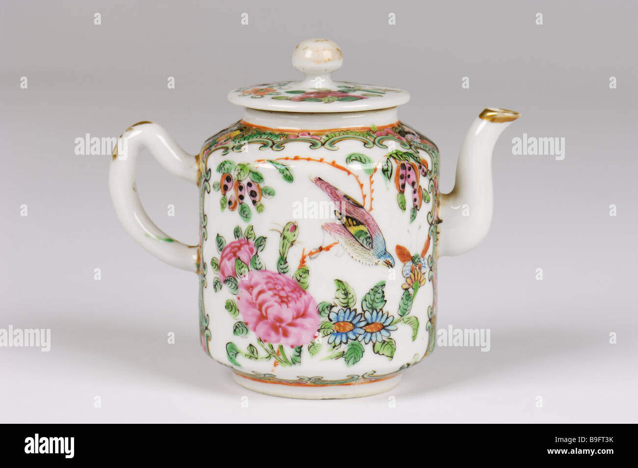 A hand painted antique Chinese porcelain tea or wine pot decorated with ...