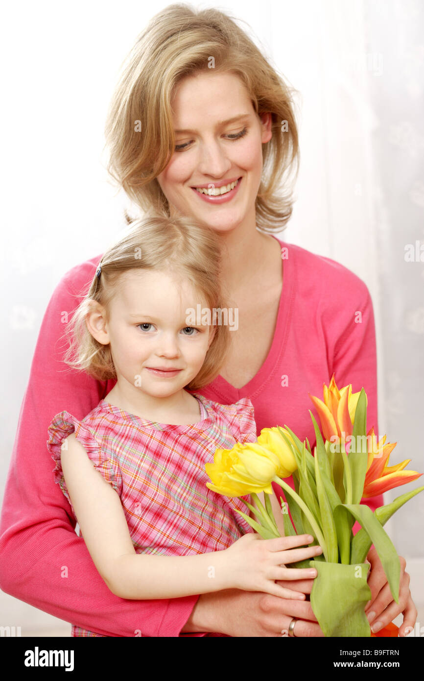Mother daughter flower-bouquet semi-portrait people woman child girl ...