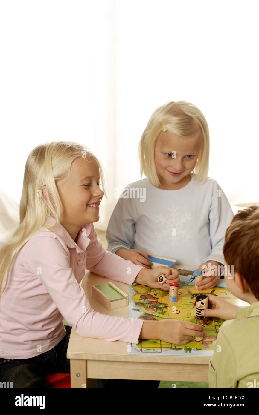 girl boy board-game cheerfully detail series people children game fun ...