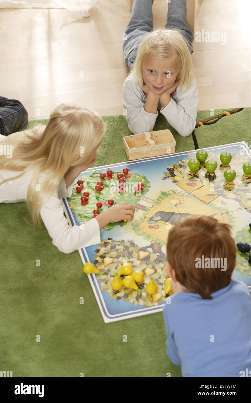 girl boy board-game "orchard" detail top view series people children ...