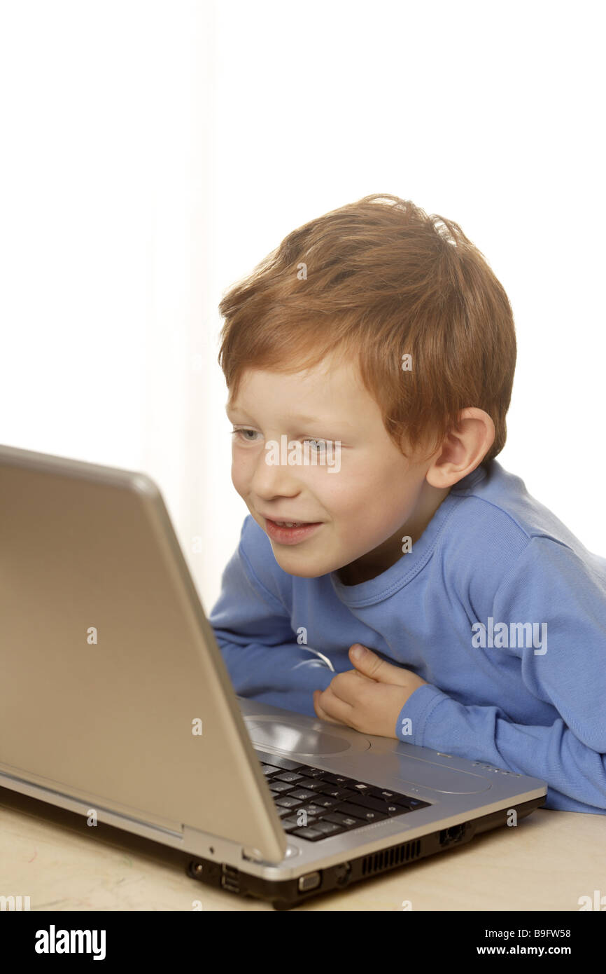 boy Notebook smiling detail series people child red haired computers ...