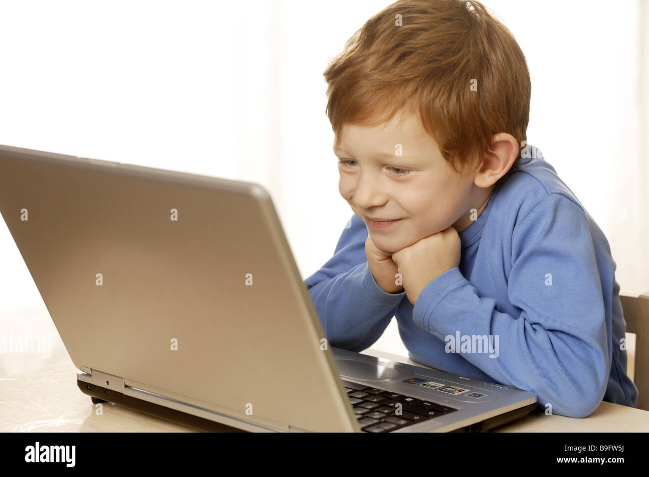 boy Notebook smiling detail series people child red haired computers ...