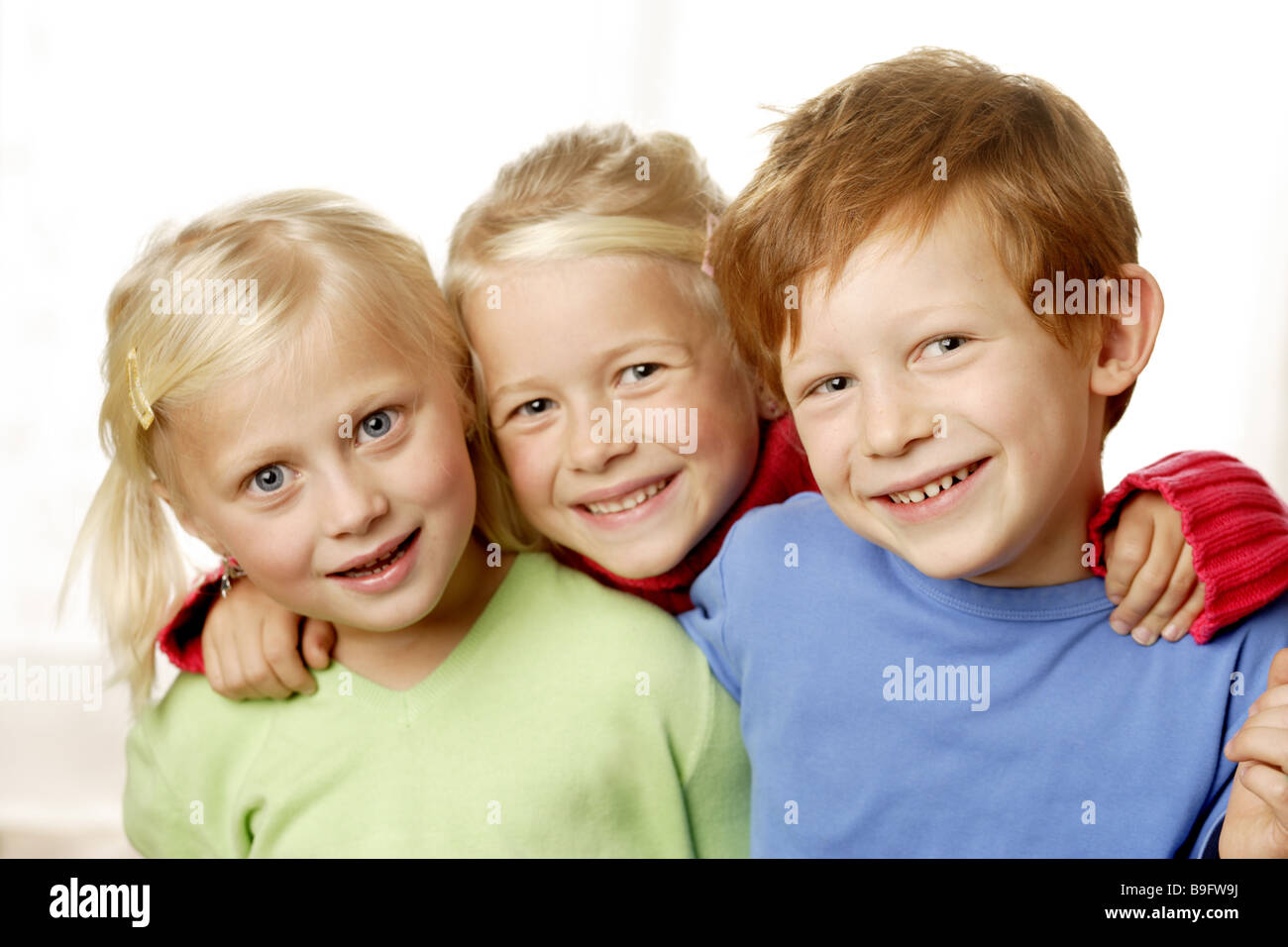 Children three laugh cheerfully portrait people siblings friends ...