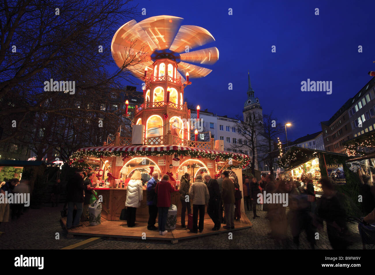 Germany Bavaria Munich Christmas market Kripperlmarkt booths people ...