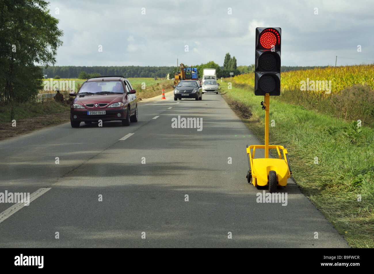 Roadworks on French country road Stock Photo - Alamy