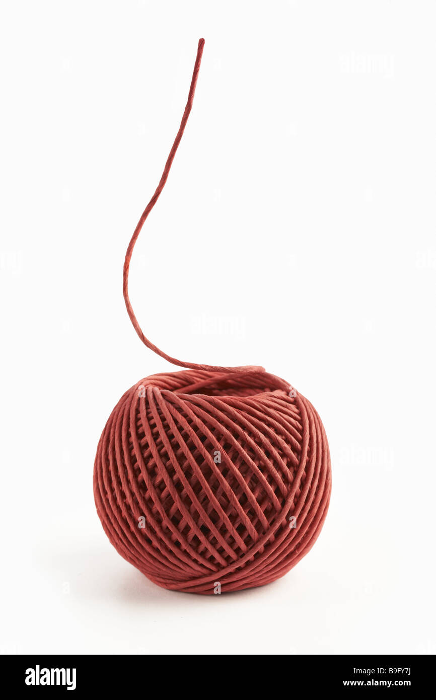 Paper-cord wad red string cord yarn rolled up twisty neatly rising end ...