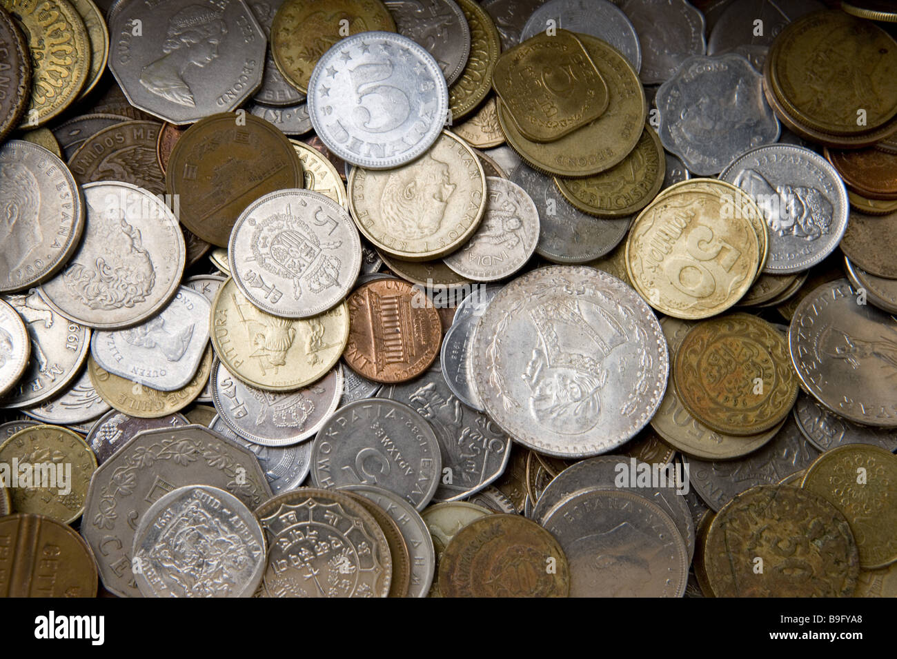 Coins differently cut-out Stock Photo - Alamy