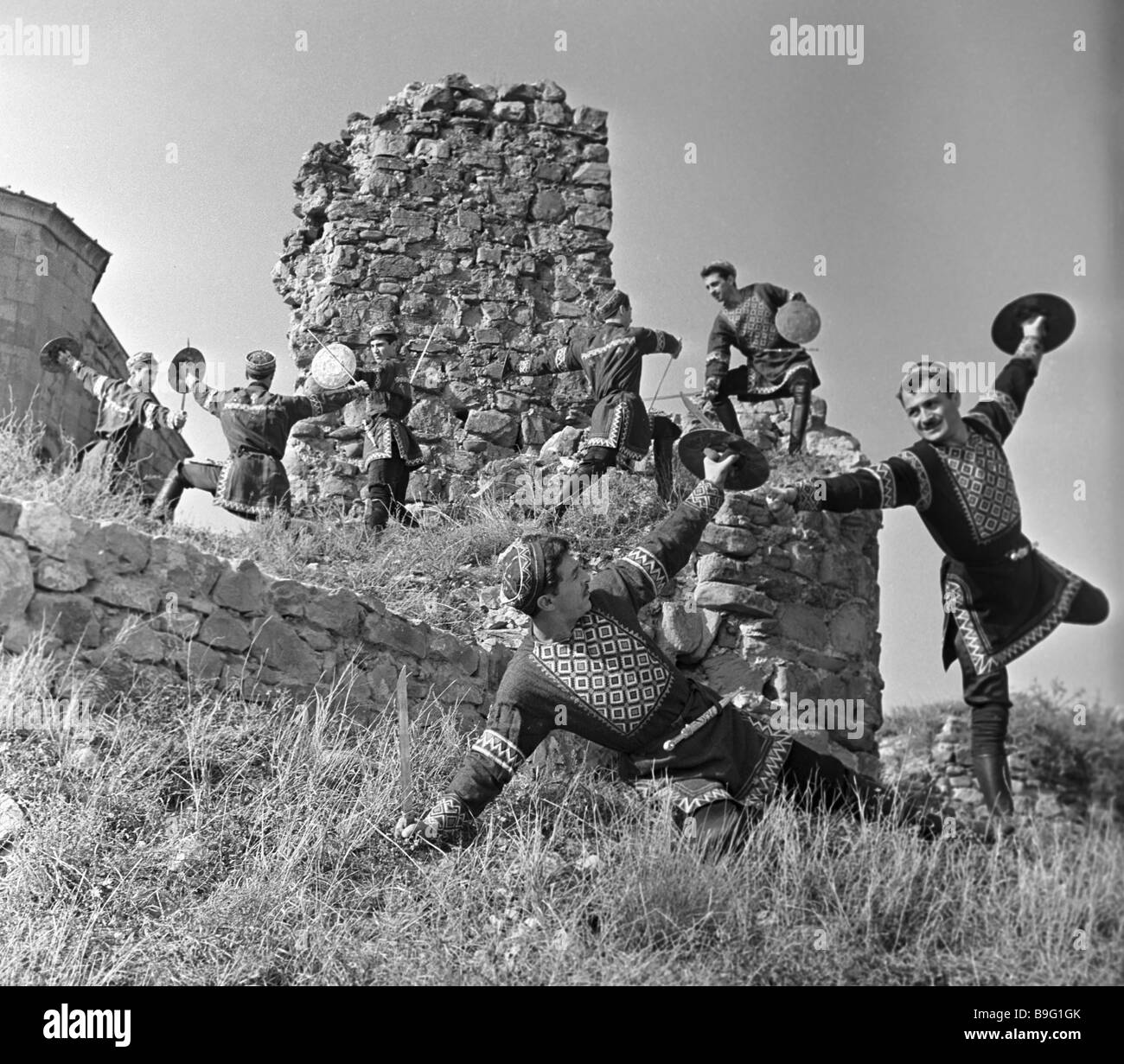 An ensemble does a traditional Georgian folk dance Stock Photo - Alamy