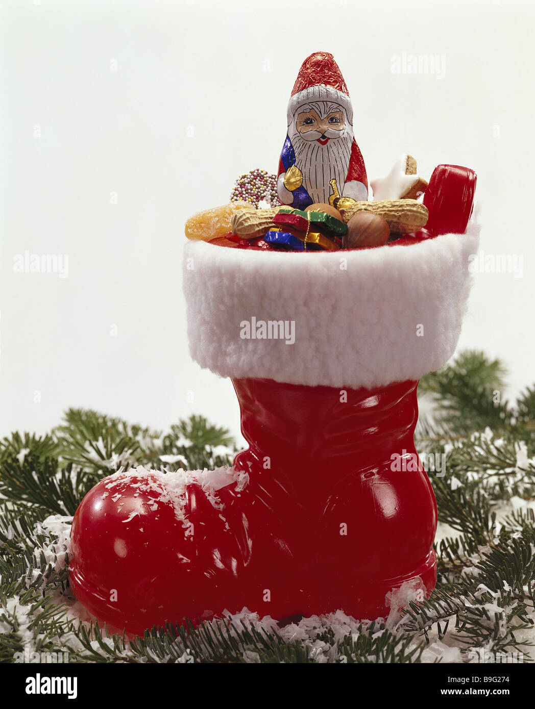 St Nicholas-boots filled candies fir-branches art-snow Christmas ...