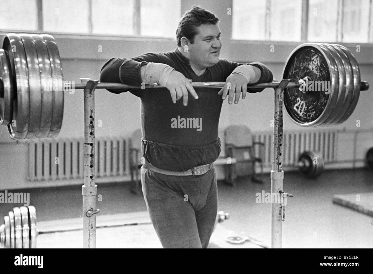 Soviet weightlifter Leonid Zhabotinsky prepares for maximum weight ...