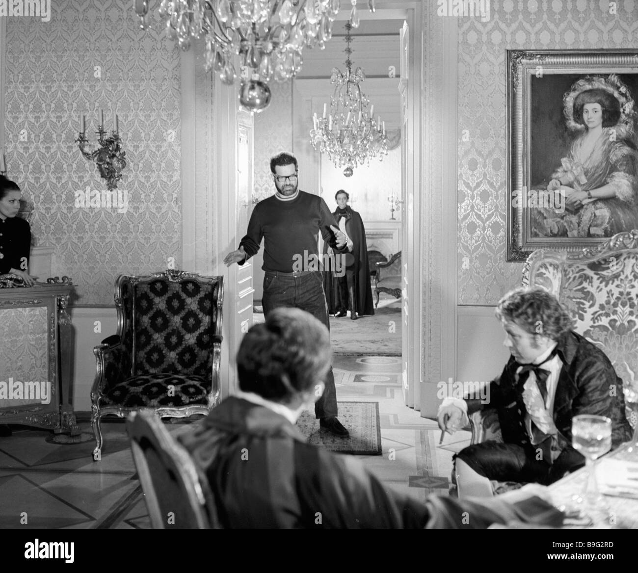 Konrad Wolf standing in the center the director of the film Goya giving ...