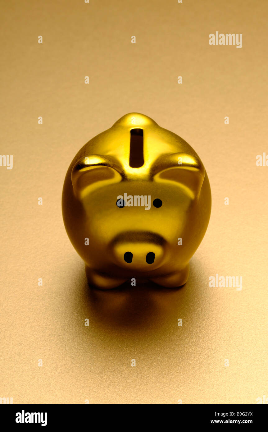 Gold piggy bank Stock Photo - Alamy