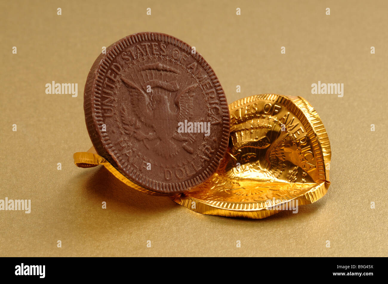 Gold chocolate coin hi-res stock photography and images - Alamy