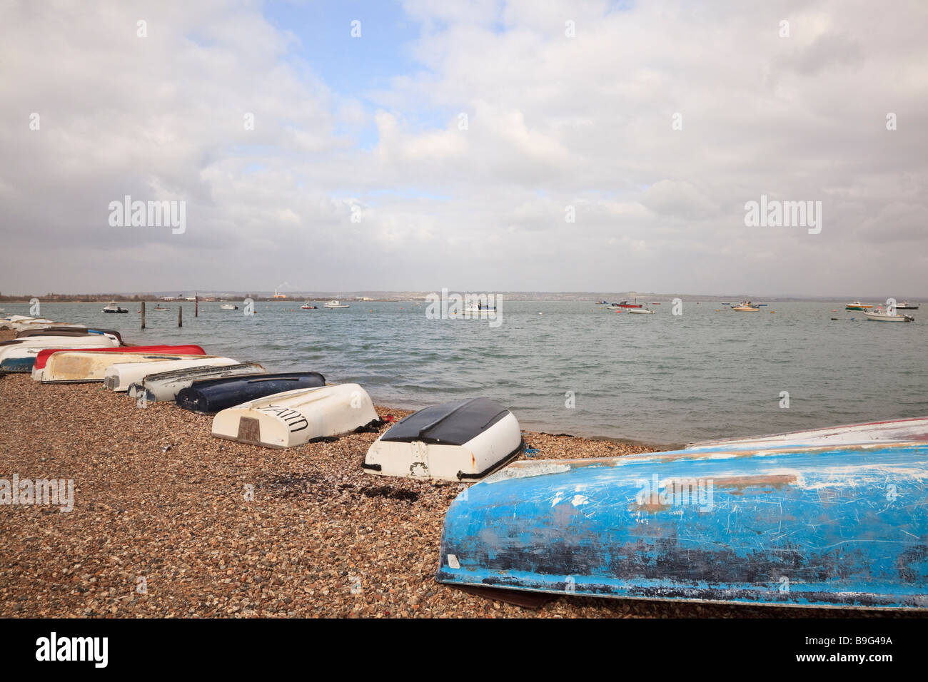 Row of dinghies hi-res stock photography and images - Alamy