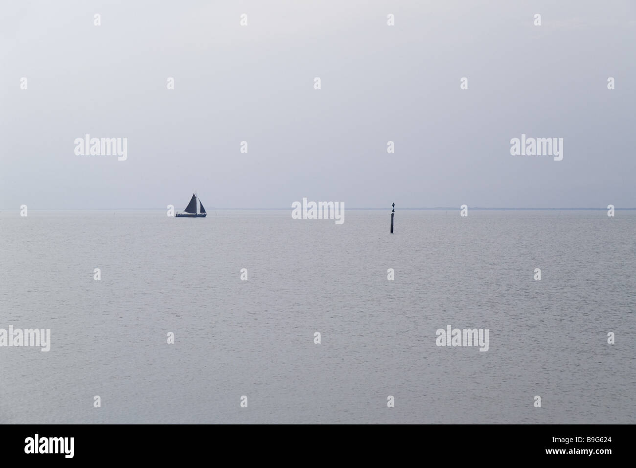 Germany East Frisia northern dike sailboat harbor-entrance Alone boat ...