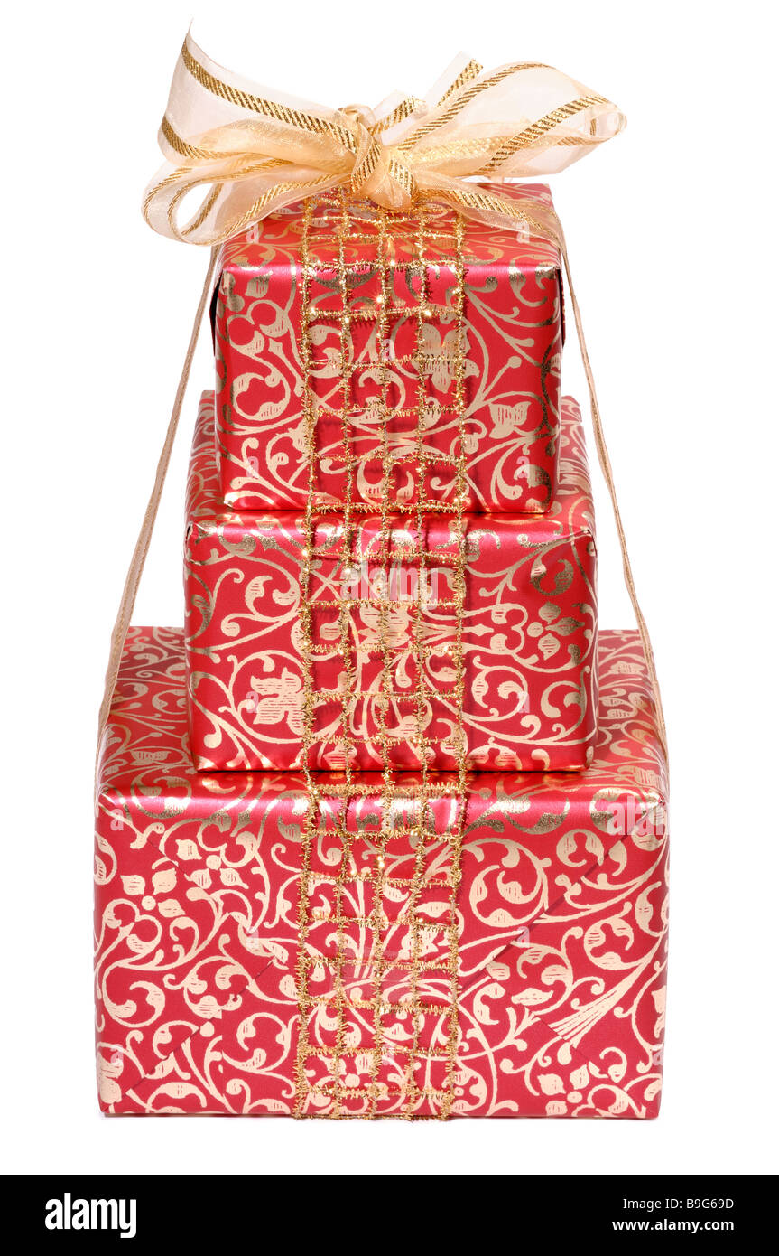 Three gift wrapped parcels Stock Photo - Alamy