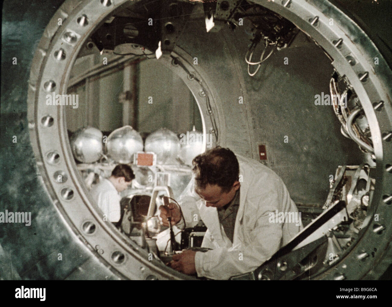 Specialist checking readiness of the descent module A still from the ...