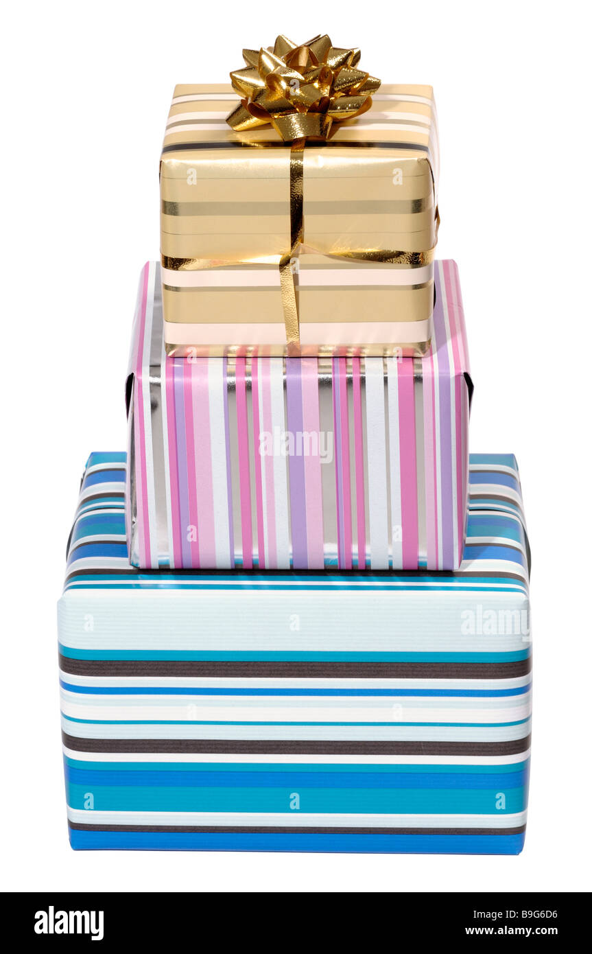 Three gift wrapped parcels Stock Photo - Alamy