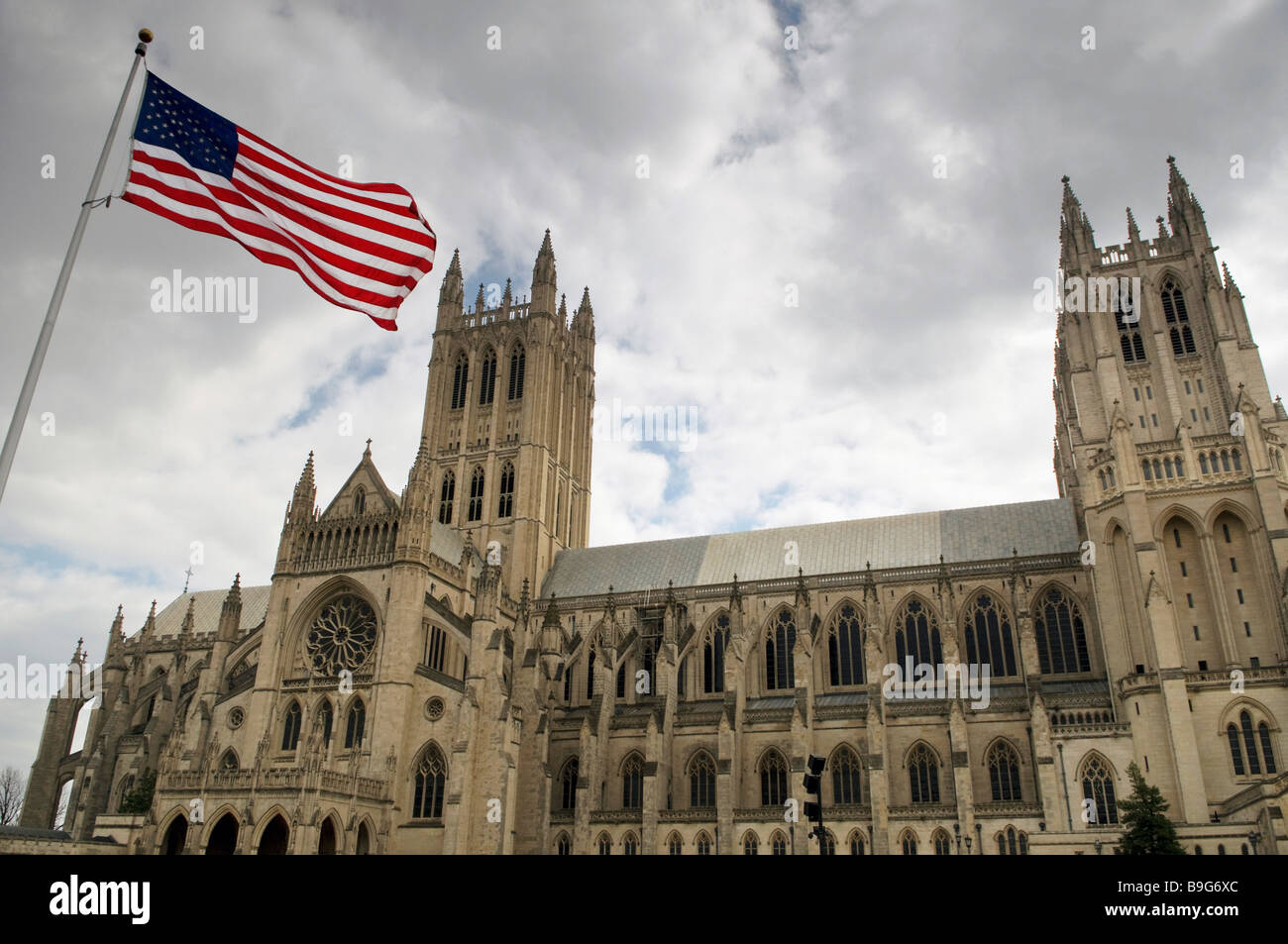 The Washington National Cathedral In Washington DC with US flag Stock ...
