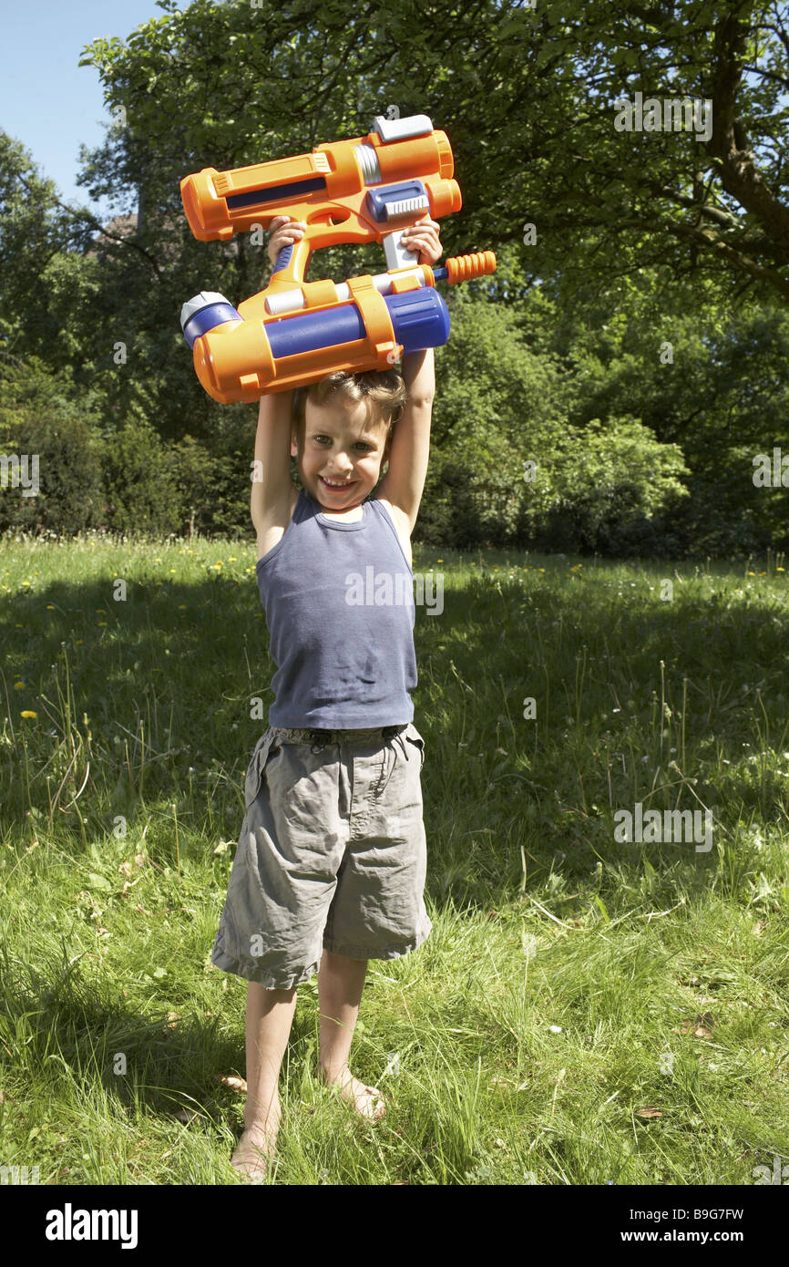 Meadow boy spraying gun hi-res stock photography and images - Alamy