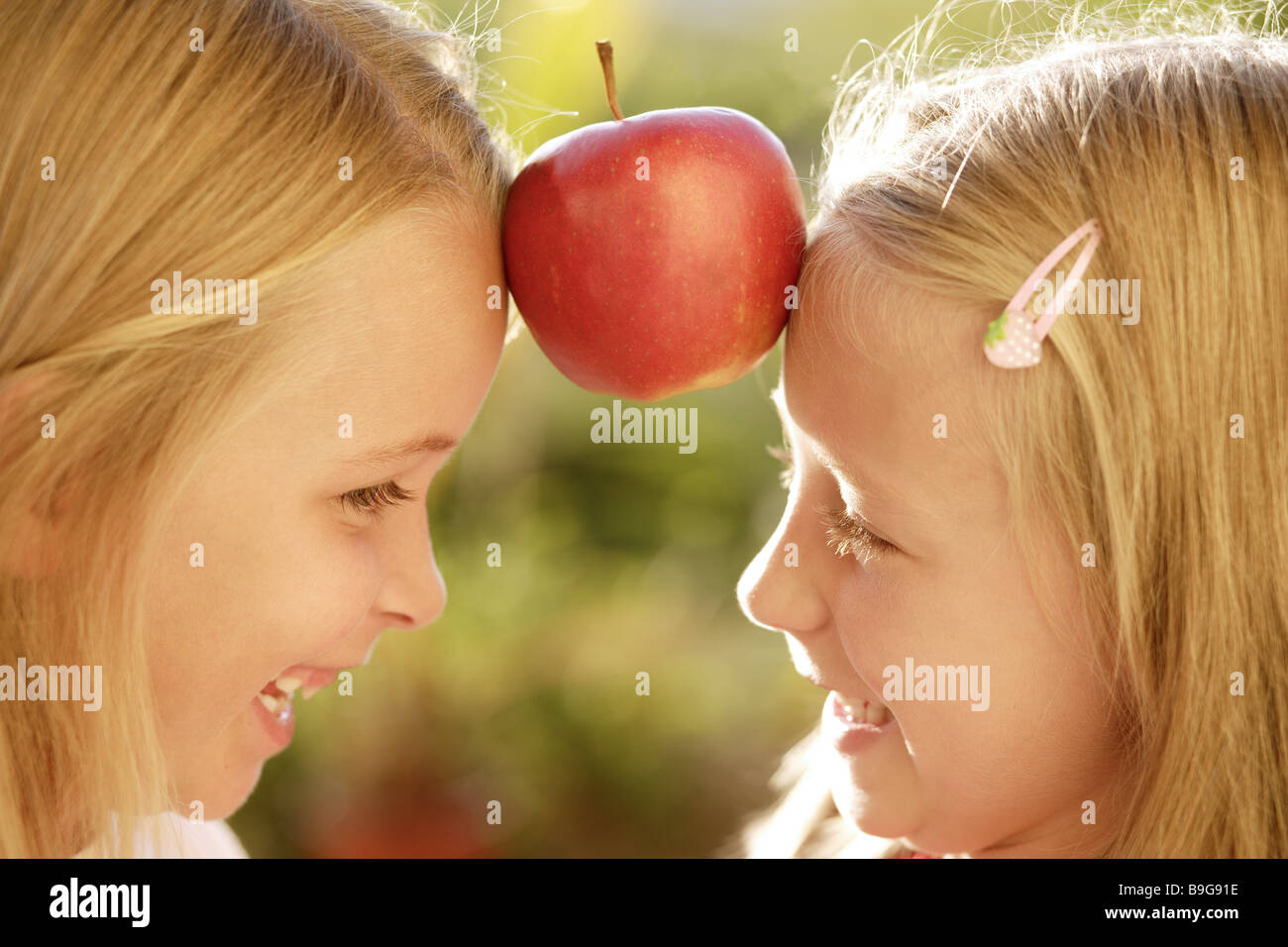 girl opposite forehead apple jams smiling portrait series people ...