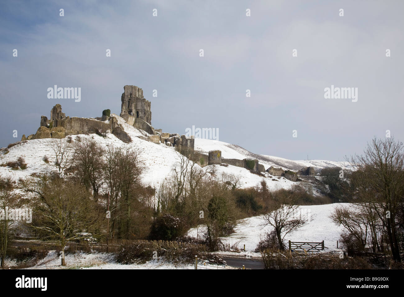 A rare fall of snow covers the Dorset landscape around the ruins of ...