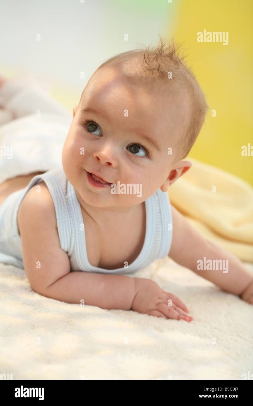 Baby lying prone position poor rest head lifts smiling portrait 5 ...