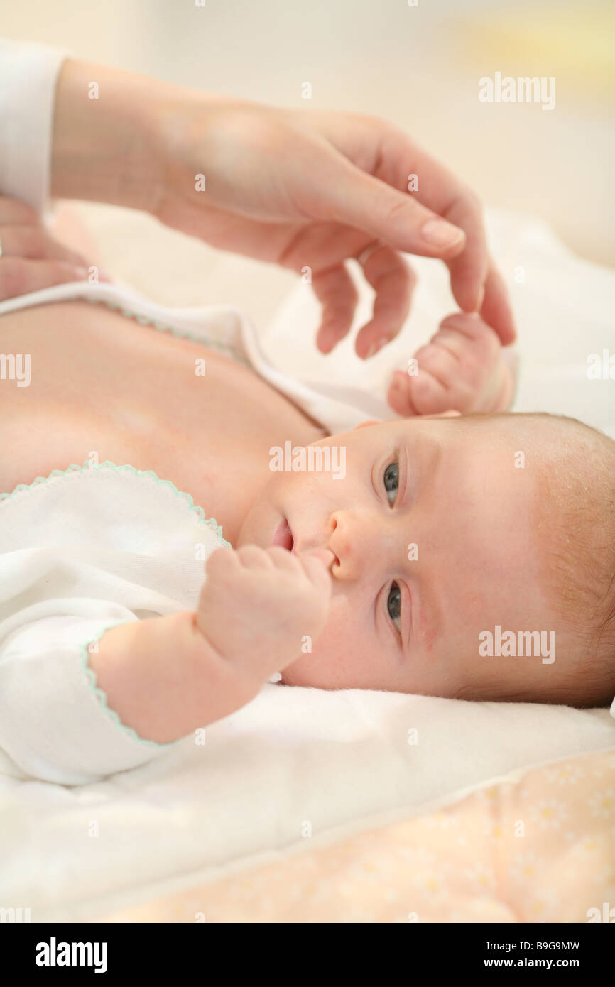 Mother baby touch hands detail 3 months excerpt baby baby-skin baby ...