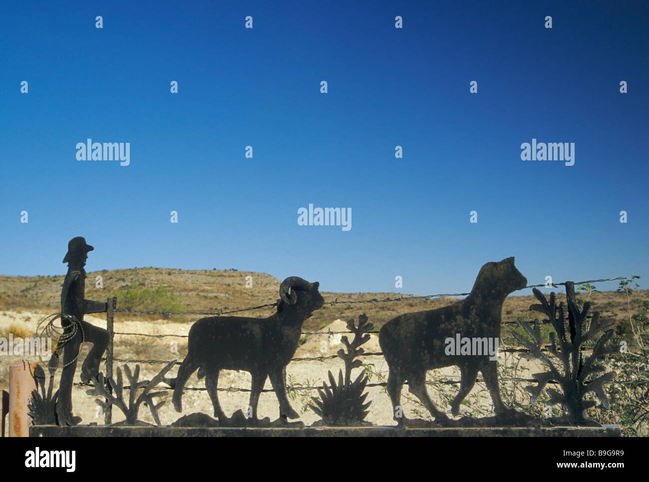 Wrought iron sign at ranch entrance near Pandale in Pecos River Valley ...