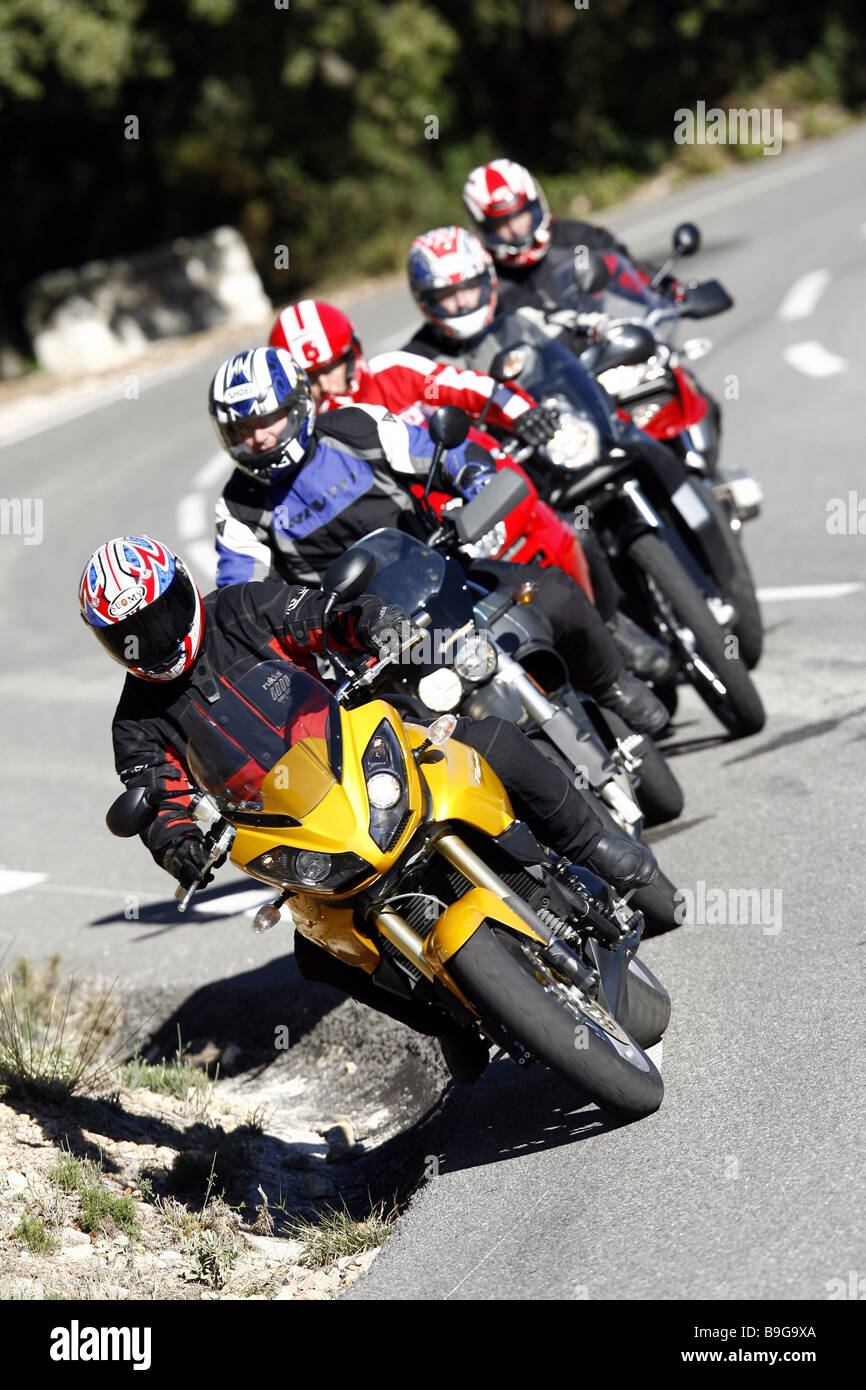 Mountain-streets curve motorcyclists five consecutively streets people ...
