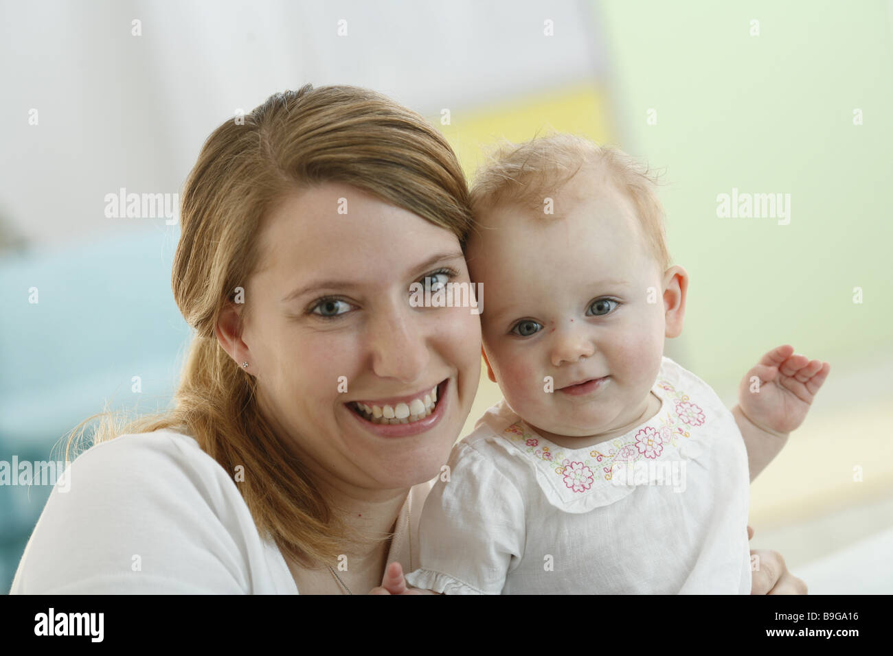 Smile mother baby portrait 20-30 years 8 months attention baby gaze ...