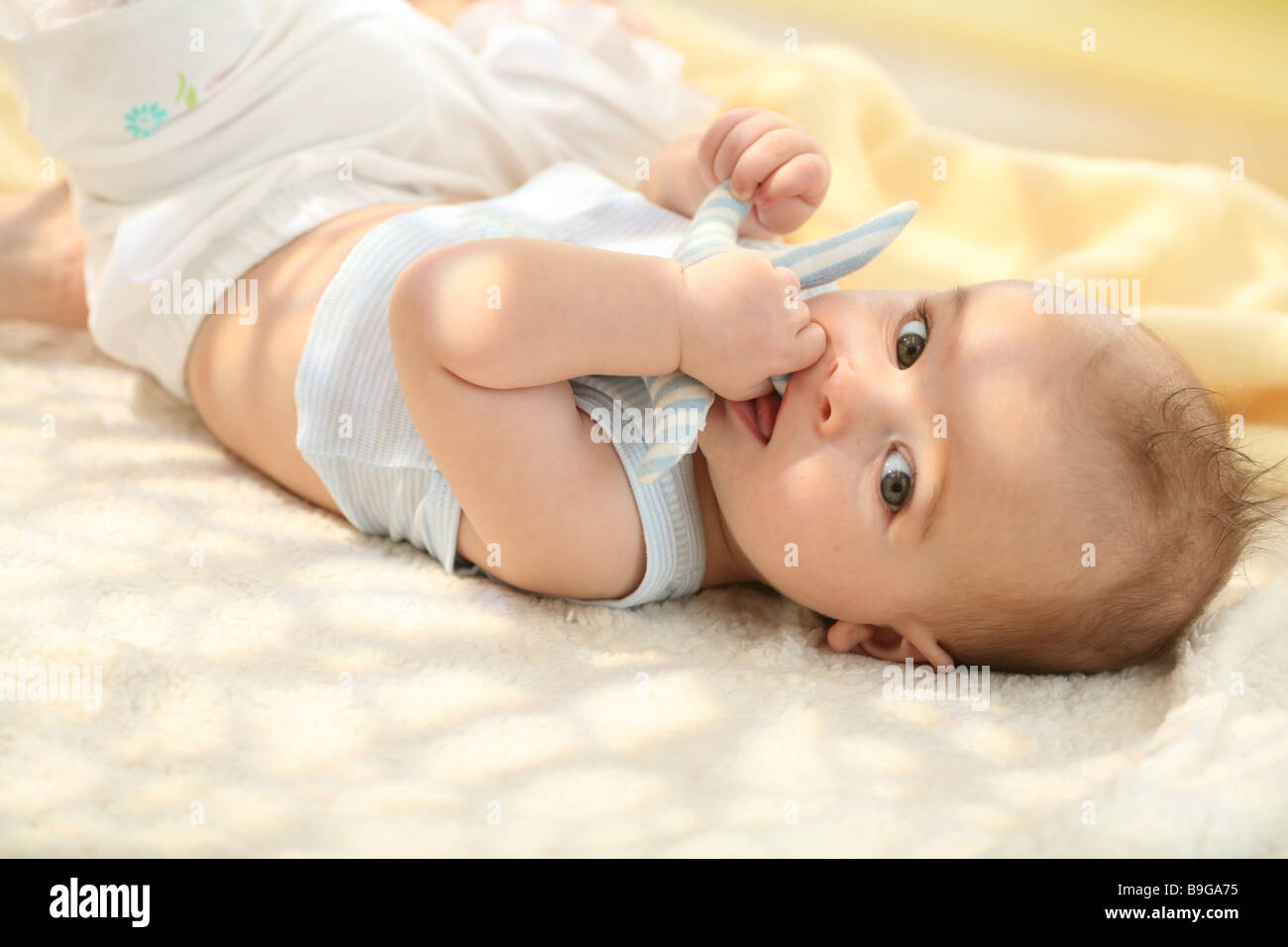 Baby supine position hi-res stock photography and images - Alamy