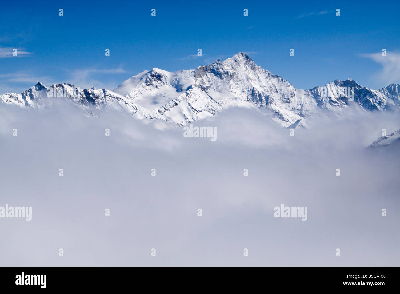 The Weisshorn Above the Mist Stock Photo - Alamy