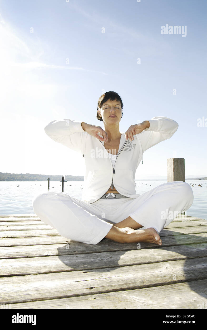 30-40 years alone balance outside barefoot brunette deeply-breathing ...