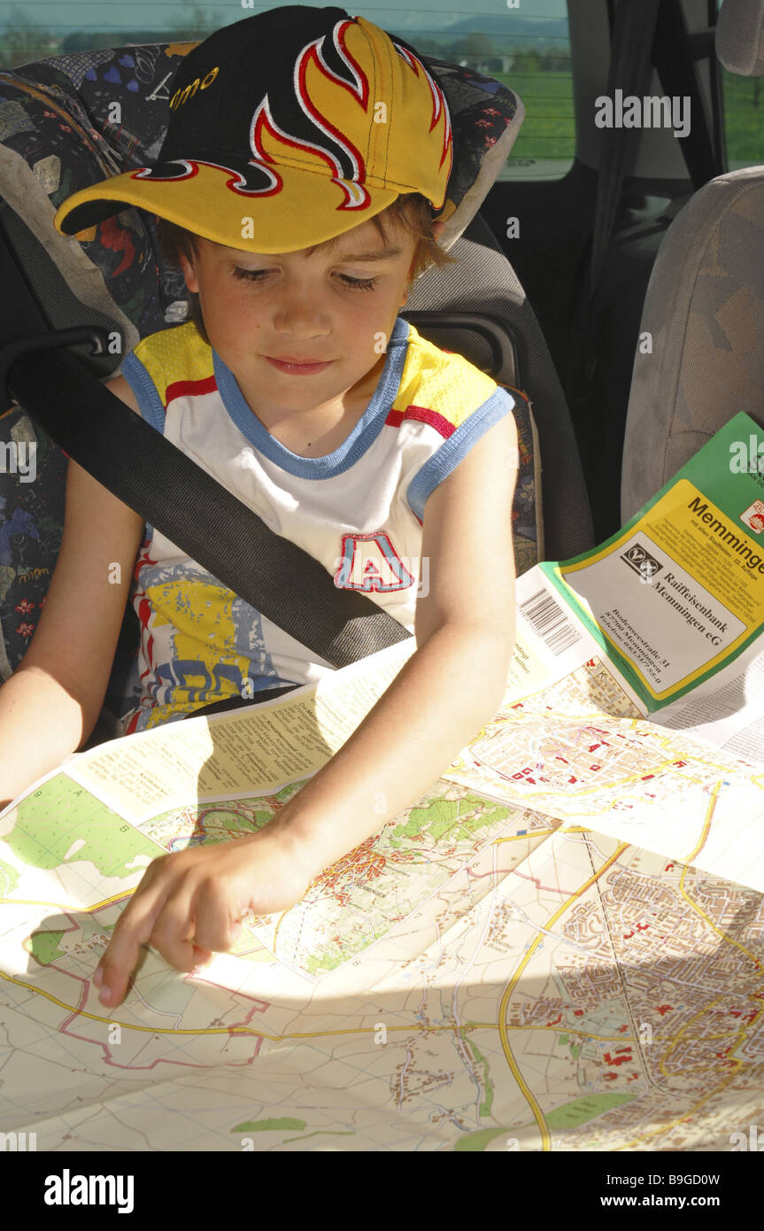 boy car back seat map Stock Photo - Alamy