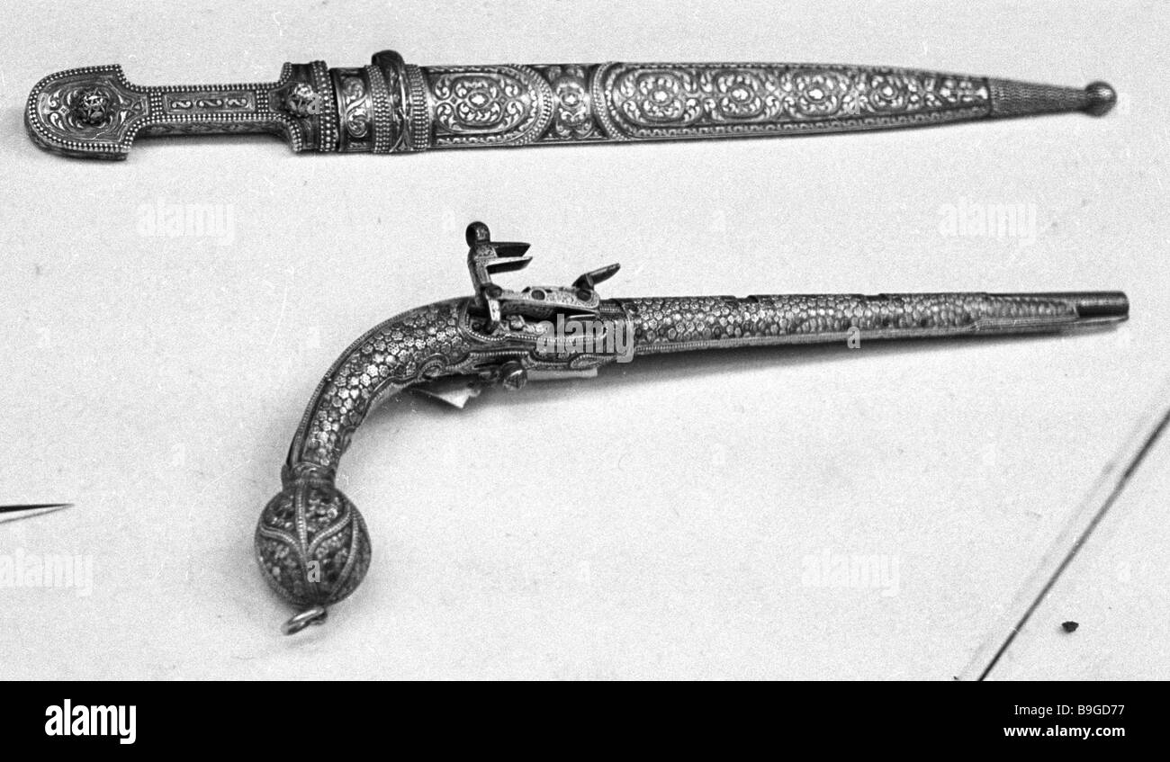 Engraved gilded and black finished Kuban weapons presented at the ...