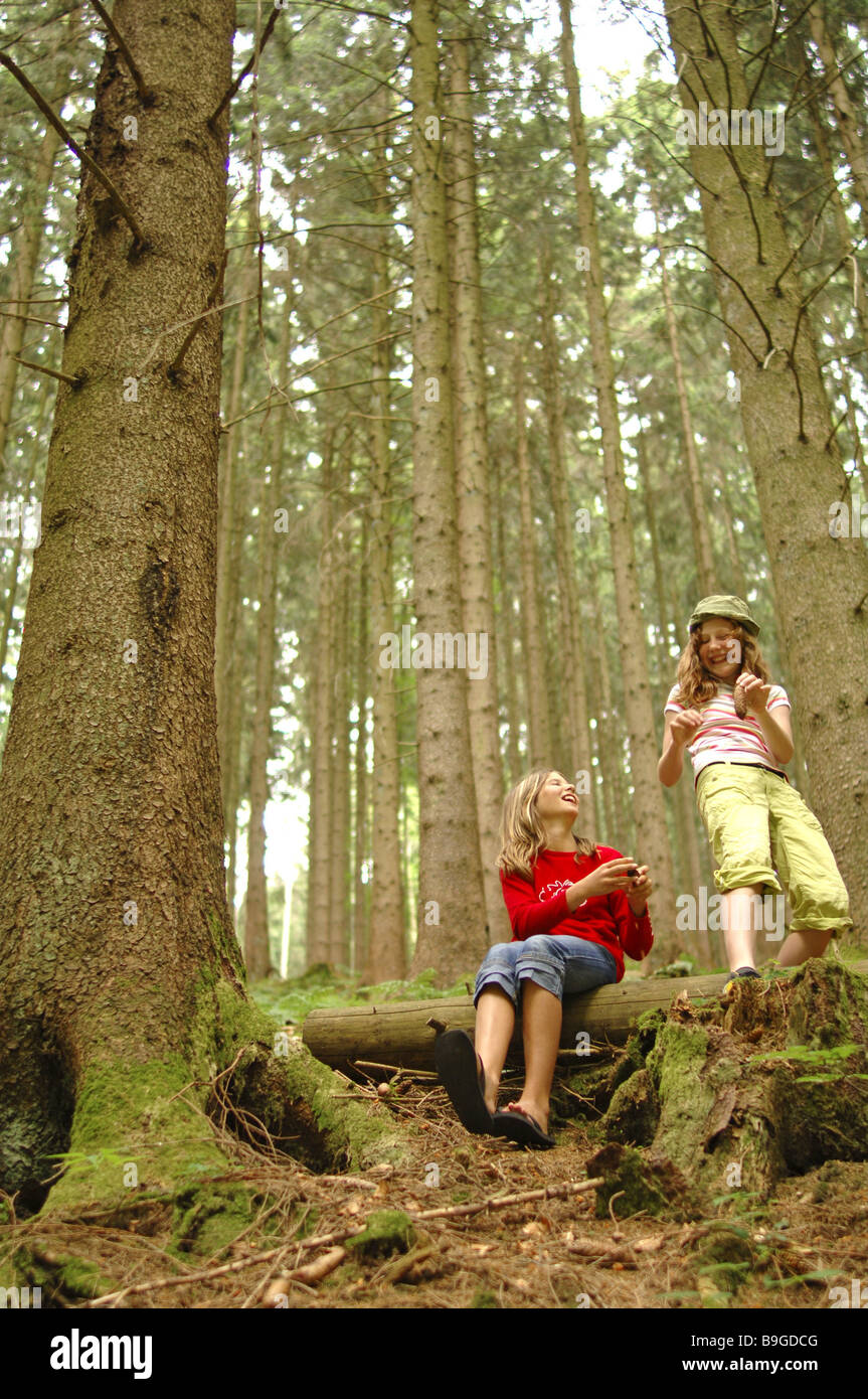 girl two forest plays explores Stock Photo - Alamy