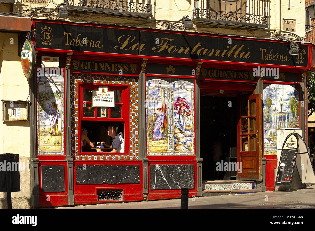 Spain Madrid pub Taberna facade tile-pictures Stock Photo - Alamy