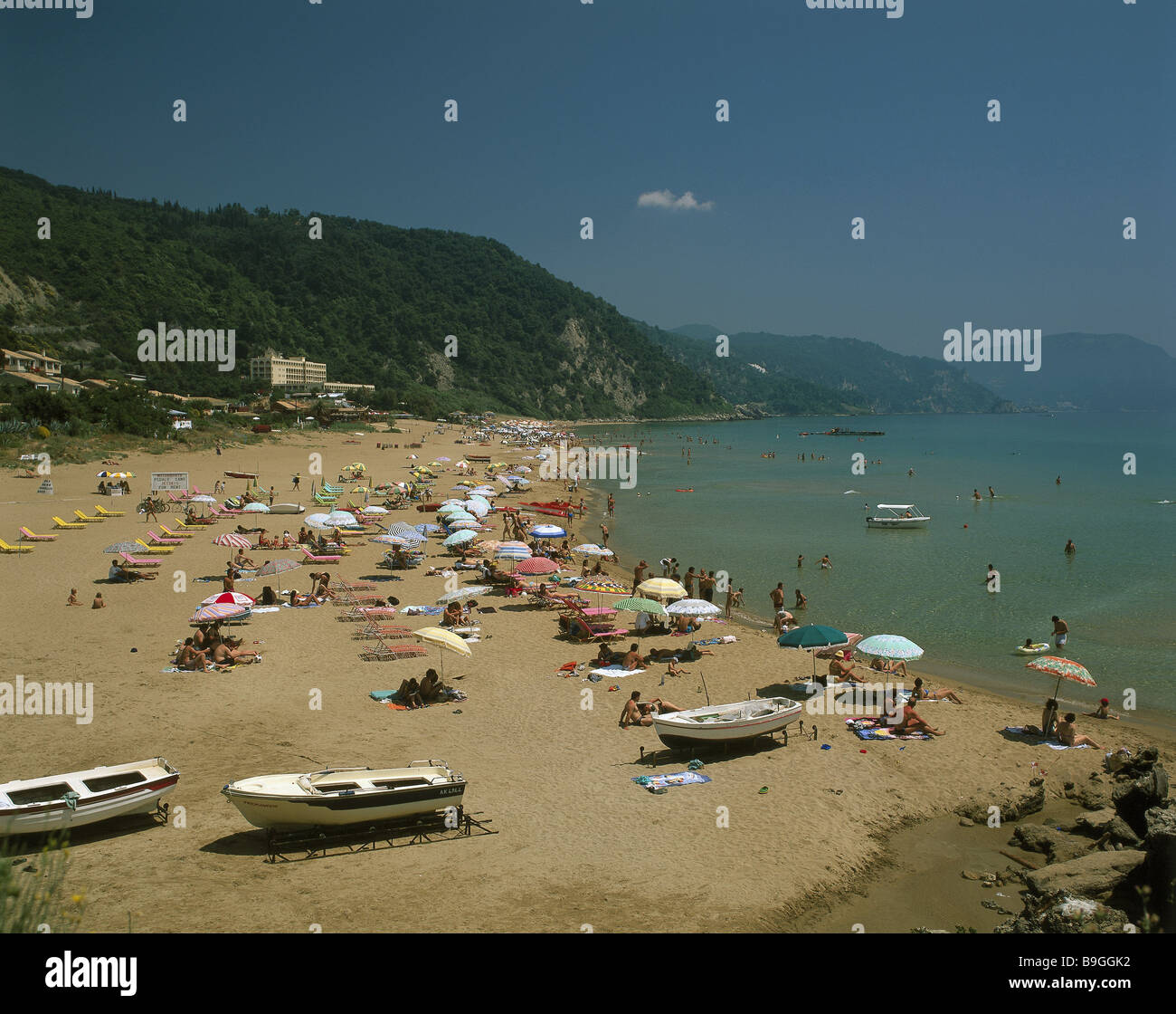 Greece island Corfu Glyfada beach-scene swimmers lake Glifada coast ...