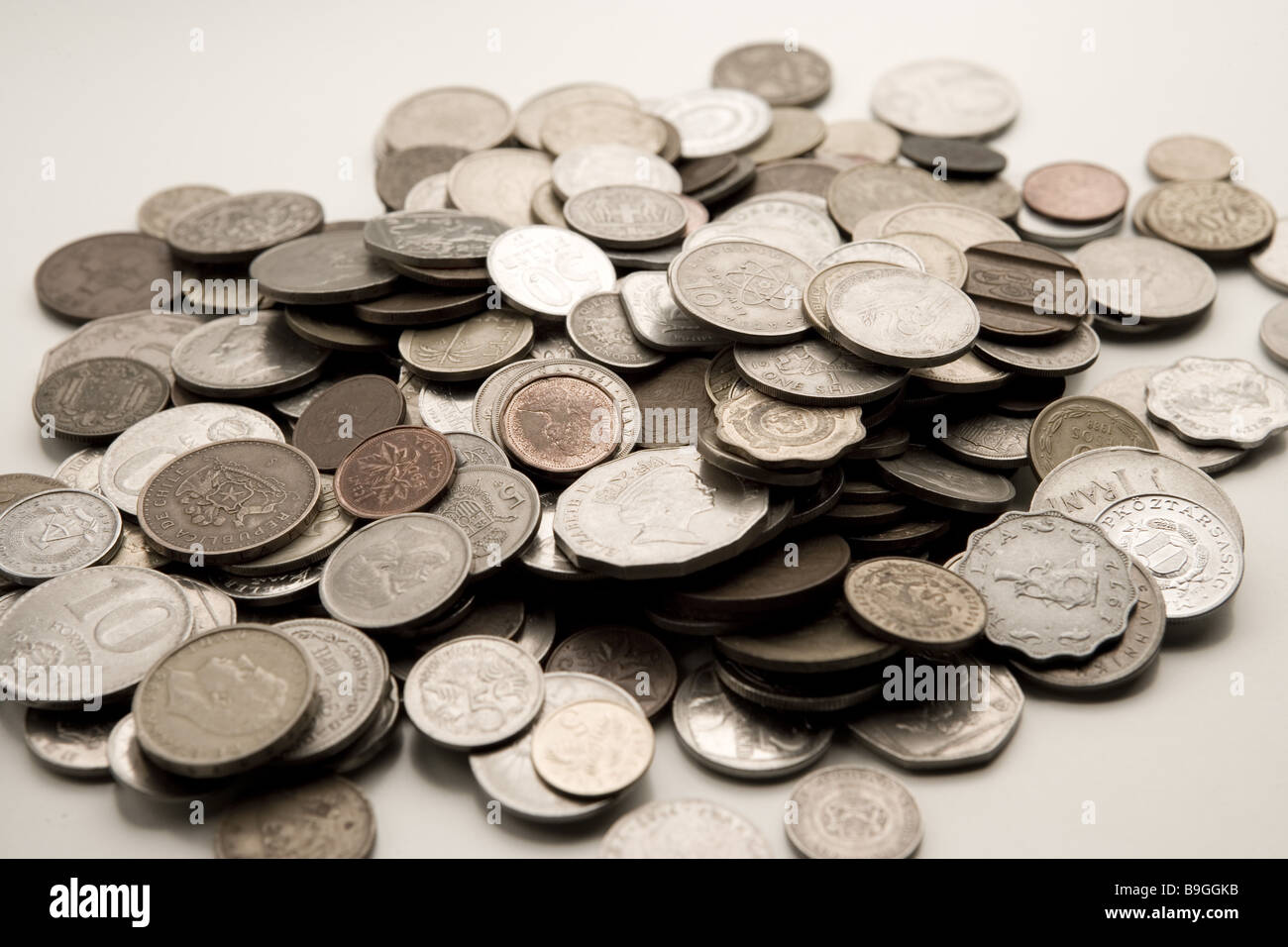 Coins differently cut-out Stock Photo - Alamy