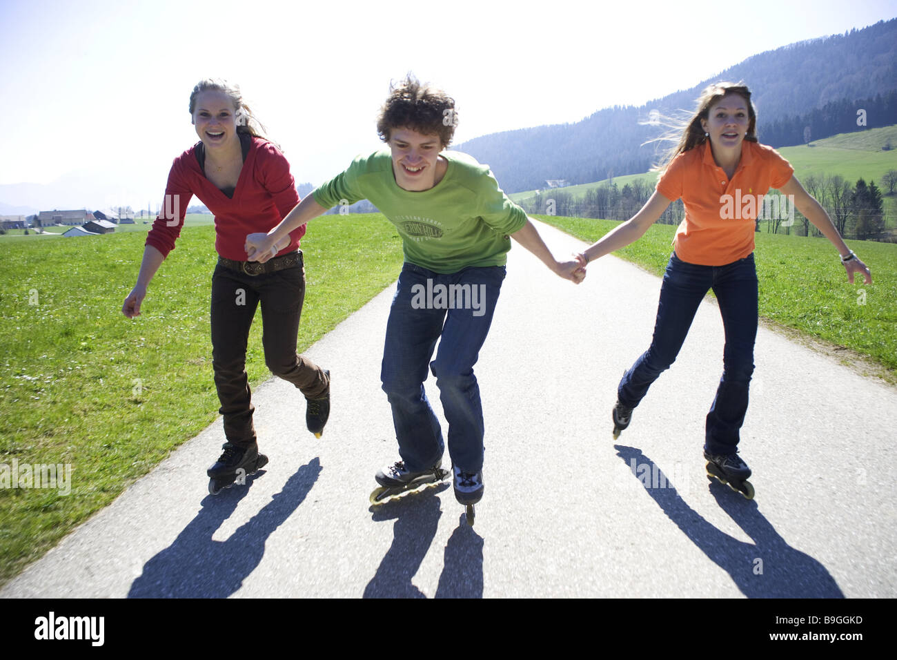 People inline skating hi-res stock photography and images - Alamy