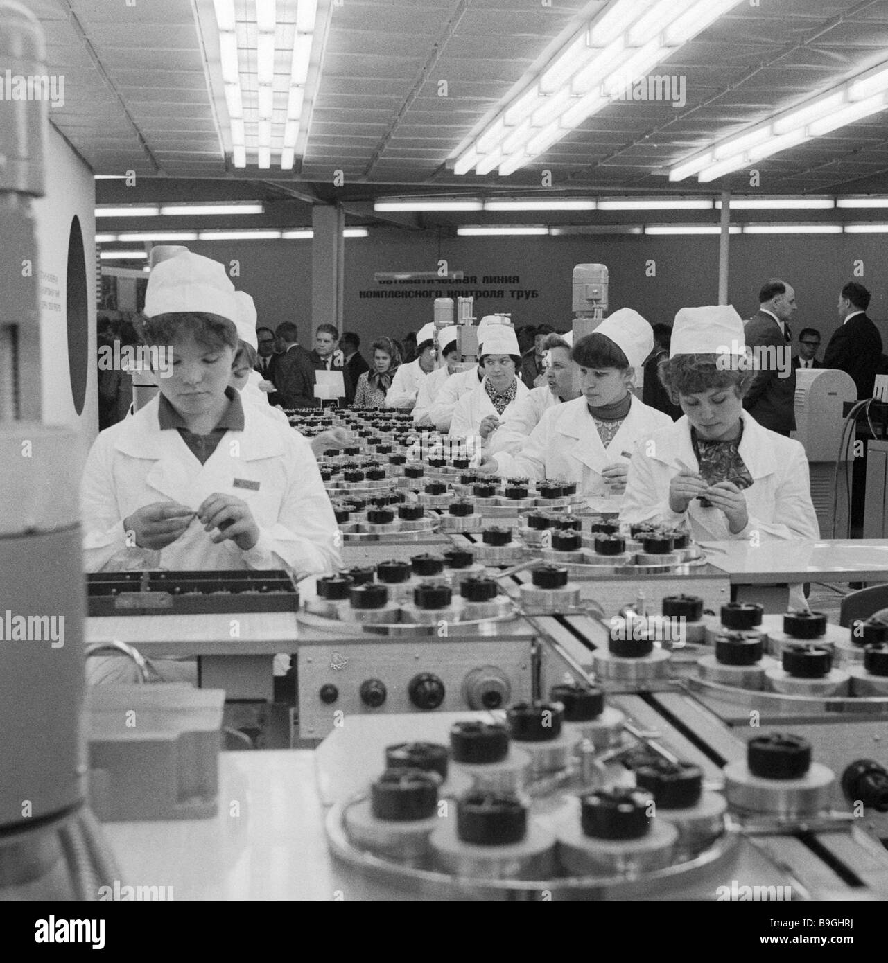 Automatic assembly line for assembling electrical equipment is ...